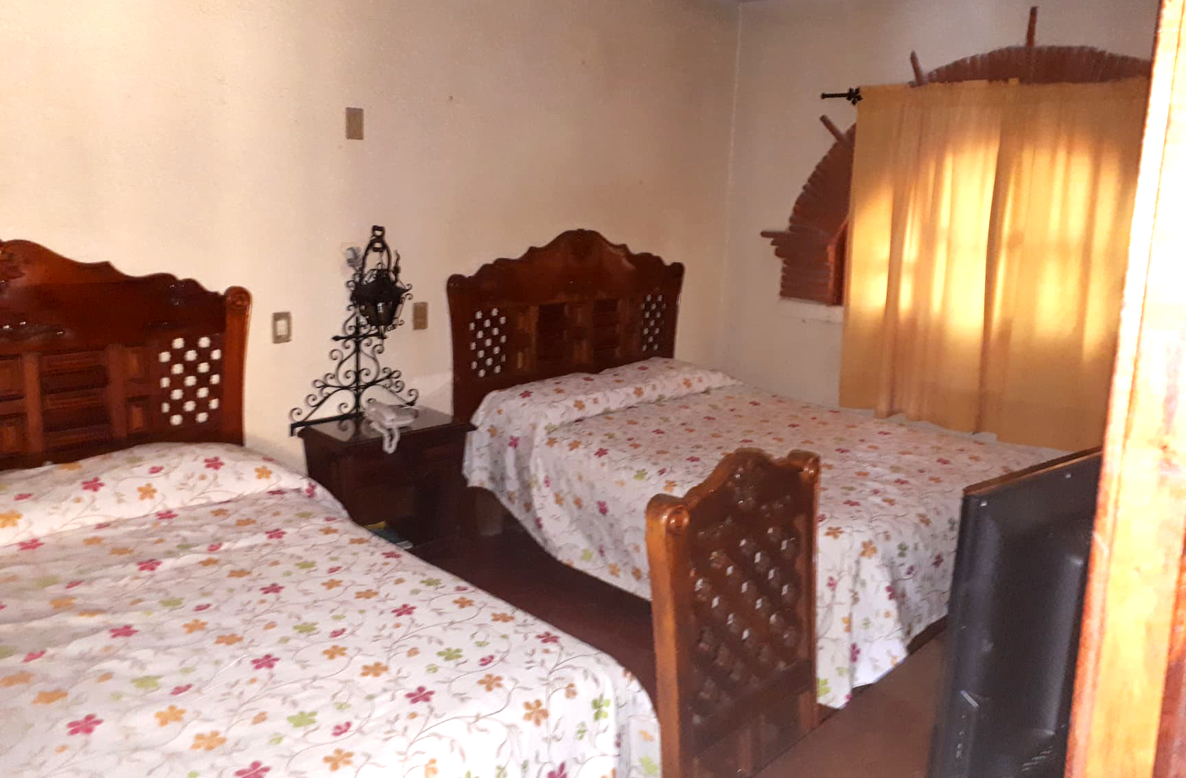 Habitación triple - Hotel Posada los Arcos